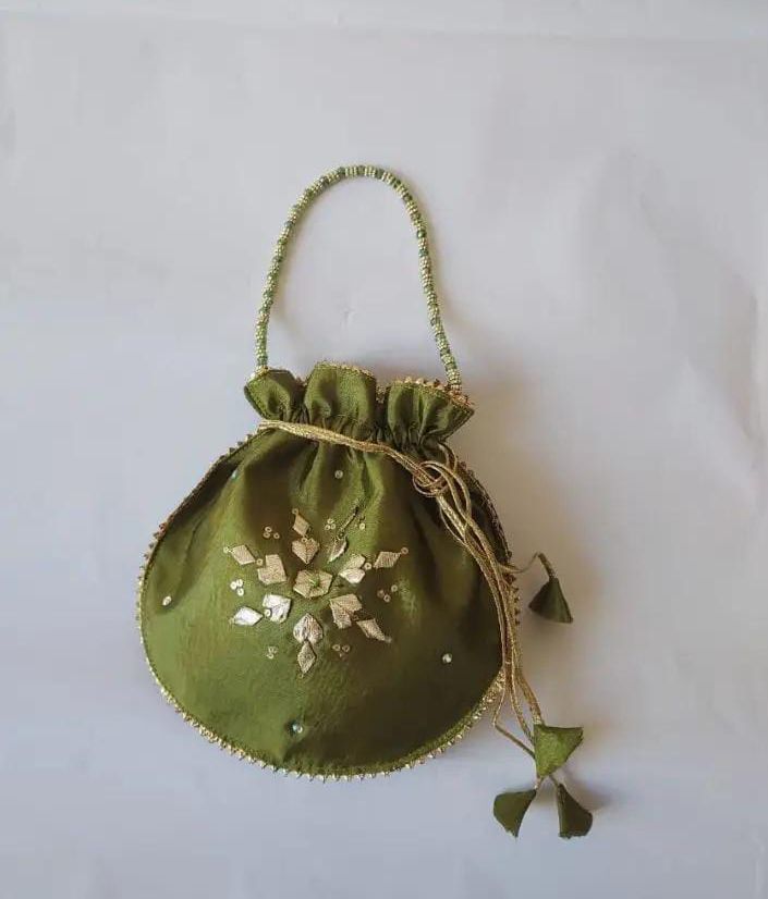 Fancy embroidered clutch/potli bag for wedding parties designer ...