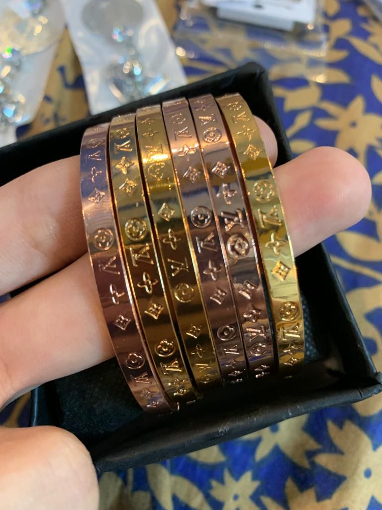 Bangles open Lock Brand Logo Golden n Copper | Daraz.pk