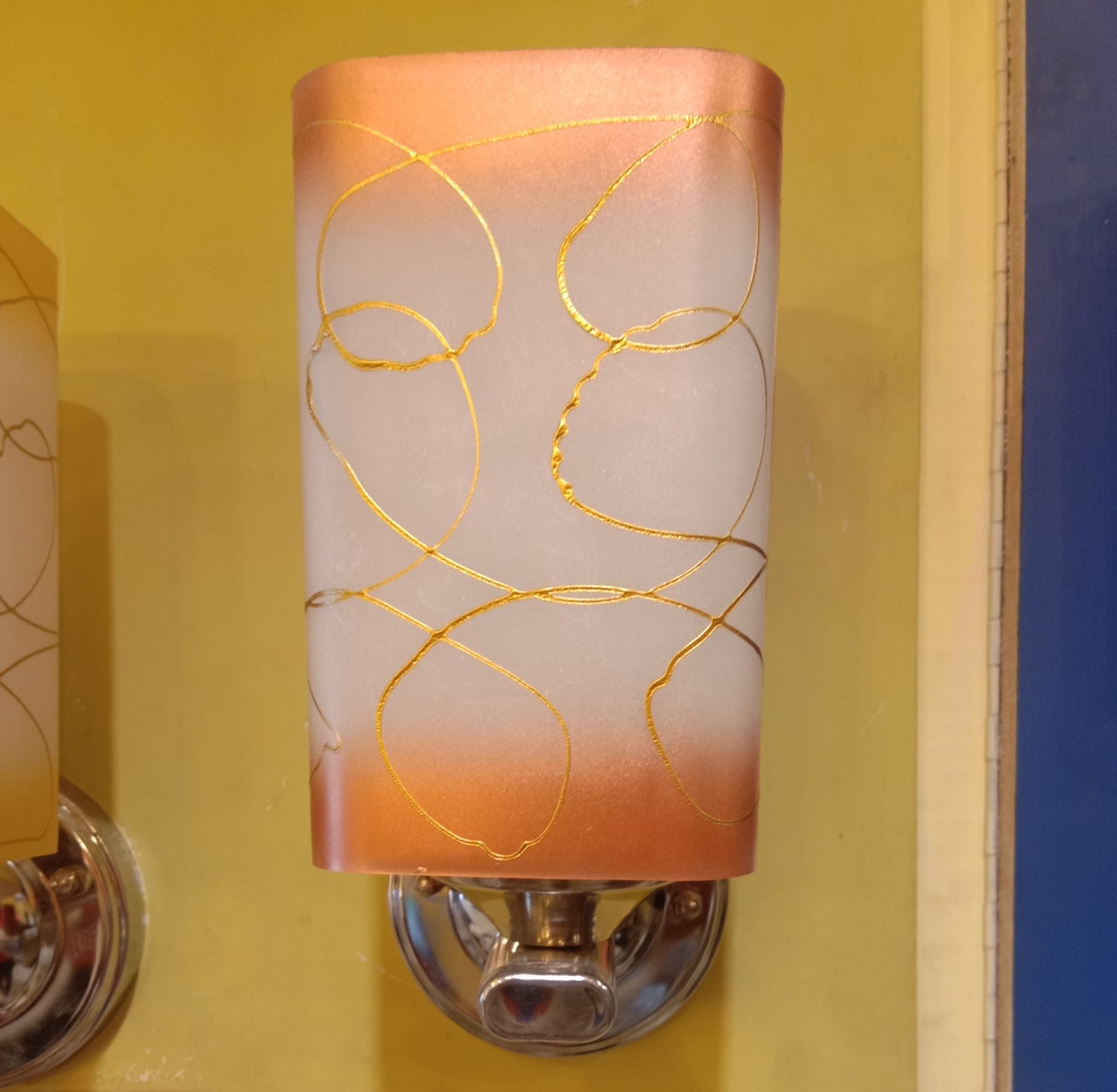 wall mounted metal arm + acrylic shade (painted) look like a glass ...
