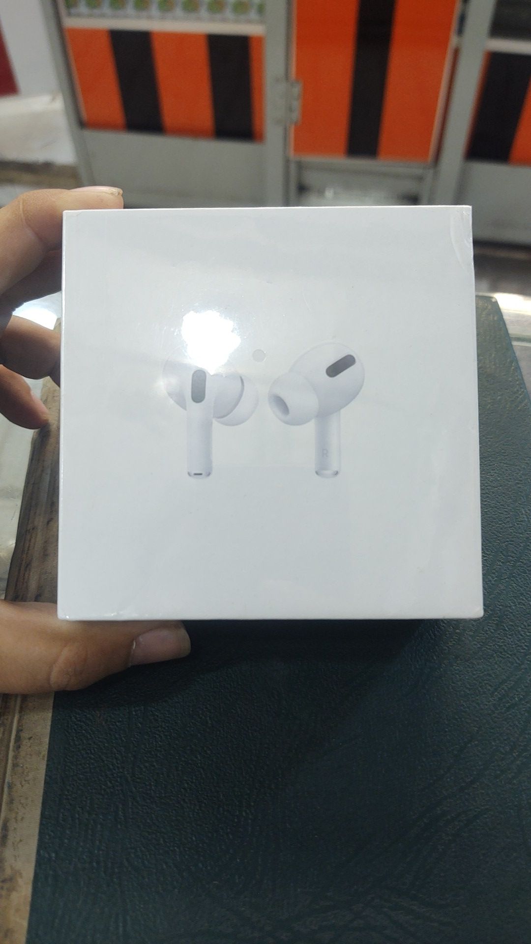 airpod pro with wirless charging case designed by apple in California ...