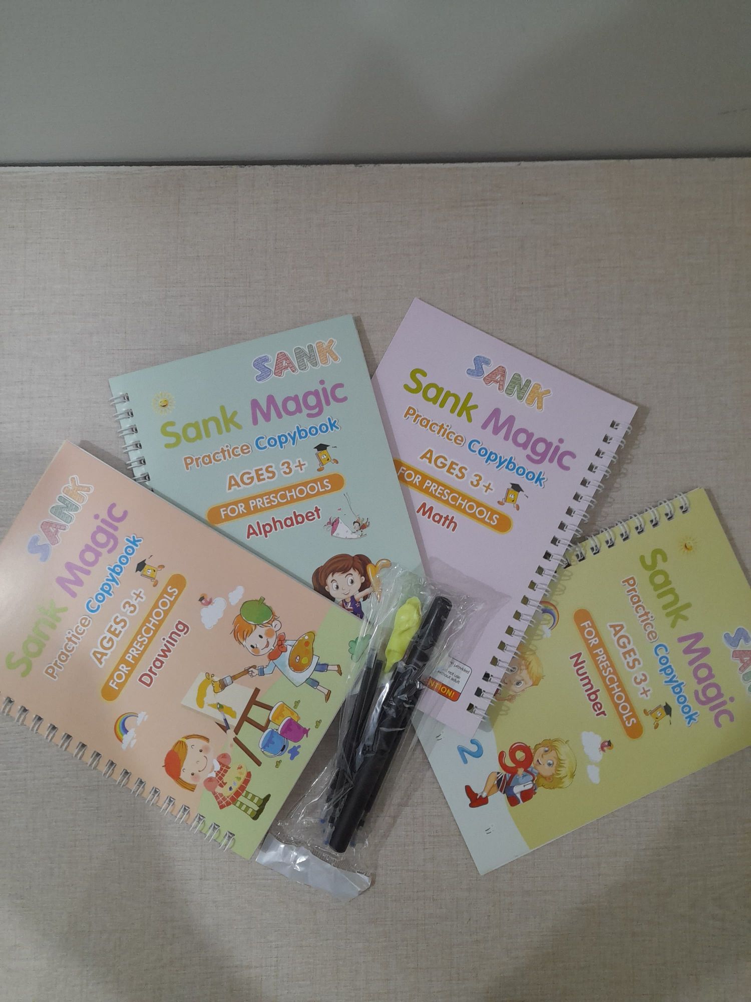 Practice Copybook for Preschoolers, 4 Sank Magic Books, 1 Magic Pen, 5 Refills, 1 Grip for ...