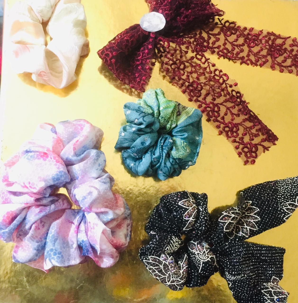 Different colours and varieties of scrunchies and bows | Daraz.pk